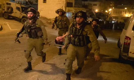 IDF soldier wounded by misfired bullet | Israel National News